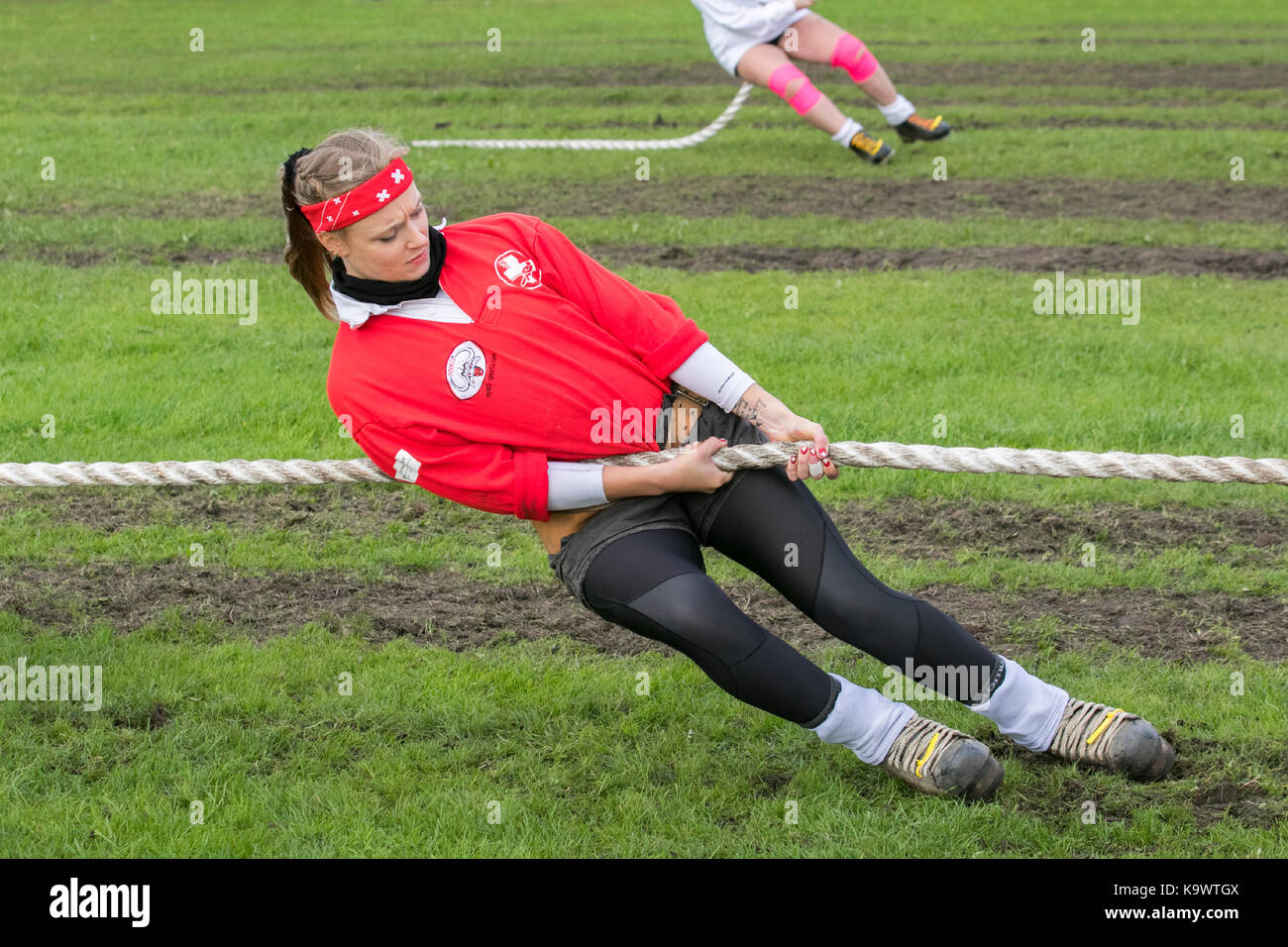 Teamwork, rope challenge, sporting event at Southport, Merseyside, UK ...