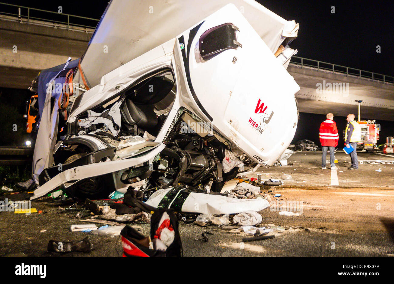 A smaller car can be seen after a deadly traffic accident involvong a ...