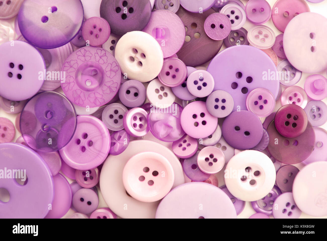 Lavender colour buttons assortment ideal for background texture for ...