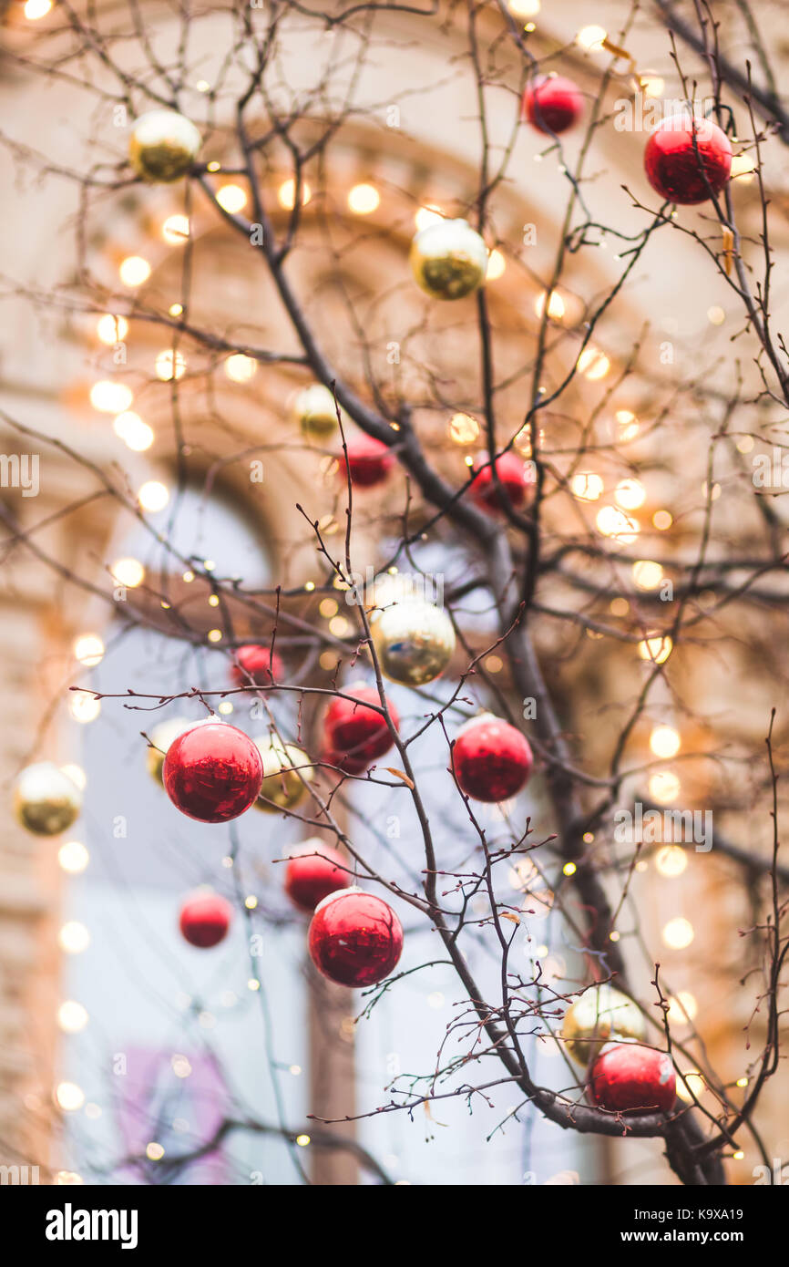 Streets fully decorated for Christmas with red and gold balls ...