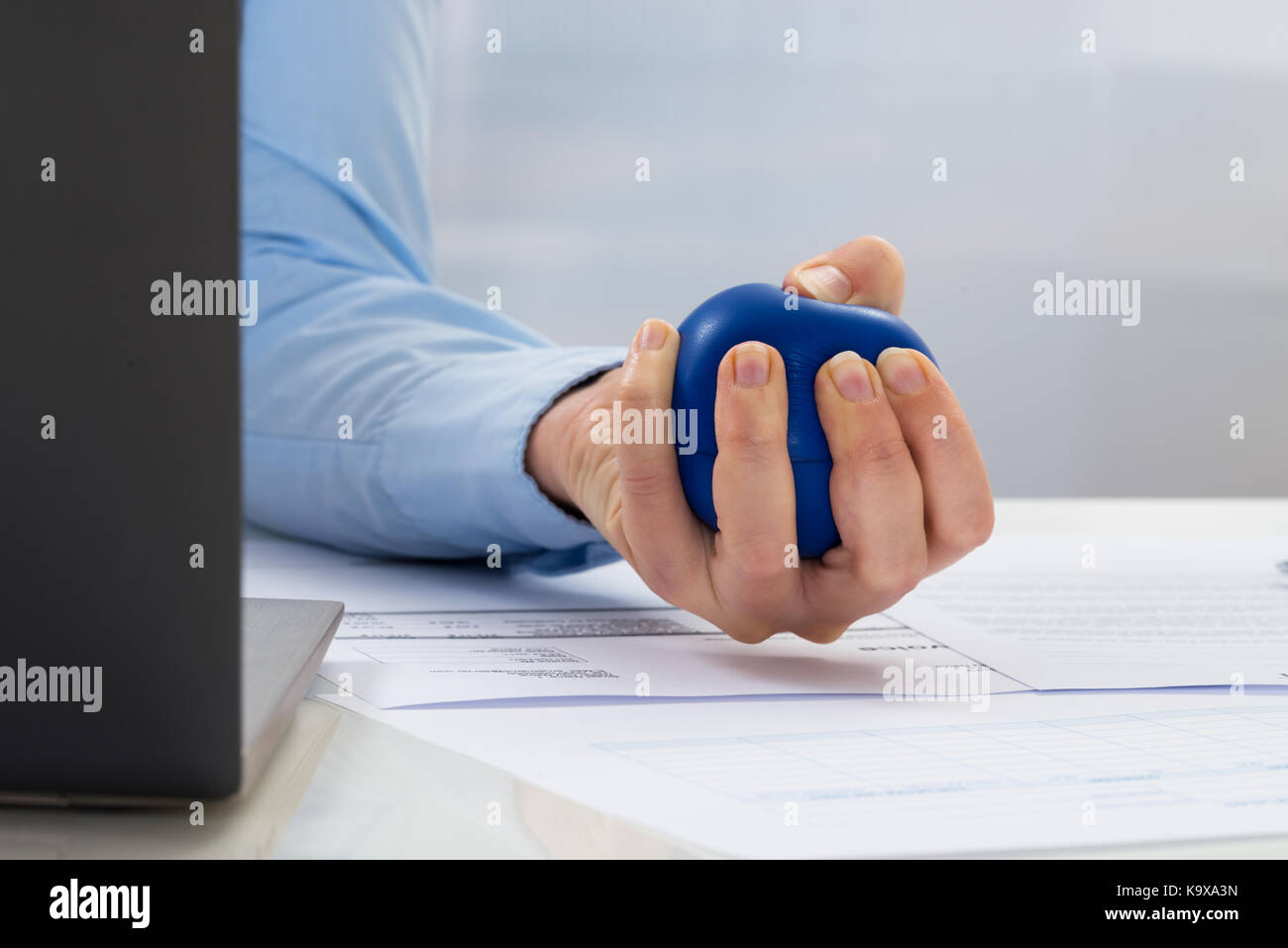 Close-up Of Businesswoman Holding Stress Ball In Hand Stock Photo - Alamy