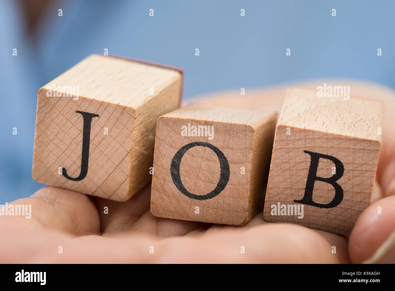 Close-up Of Person Hand Holding The Word Job On Blocks Stock Photo - Alamy
