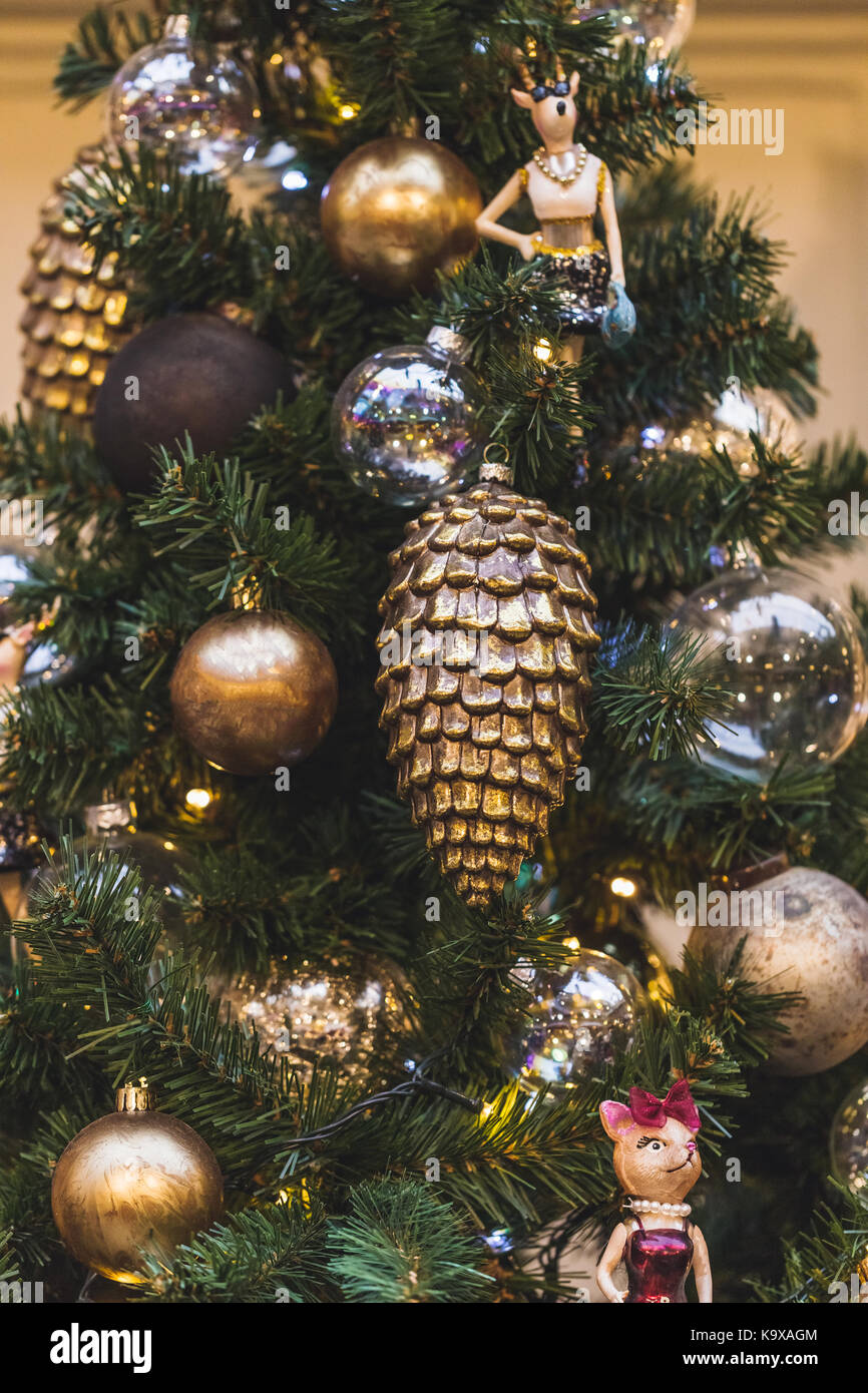 Beautiful gold colored decorations of Christmas tree Stock Photo - Alamy
