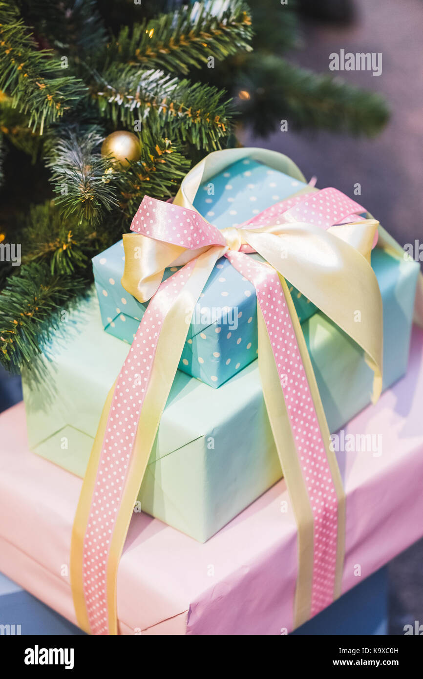 Beautiful boxes with gifts under a decorated Christmas tree Stock Photo ...