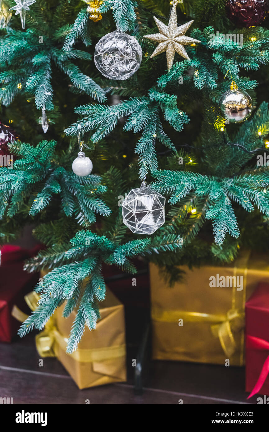 Baby under a christmas tree hi-res stock photography and images - Alamy