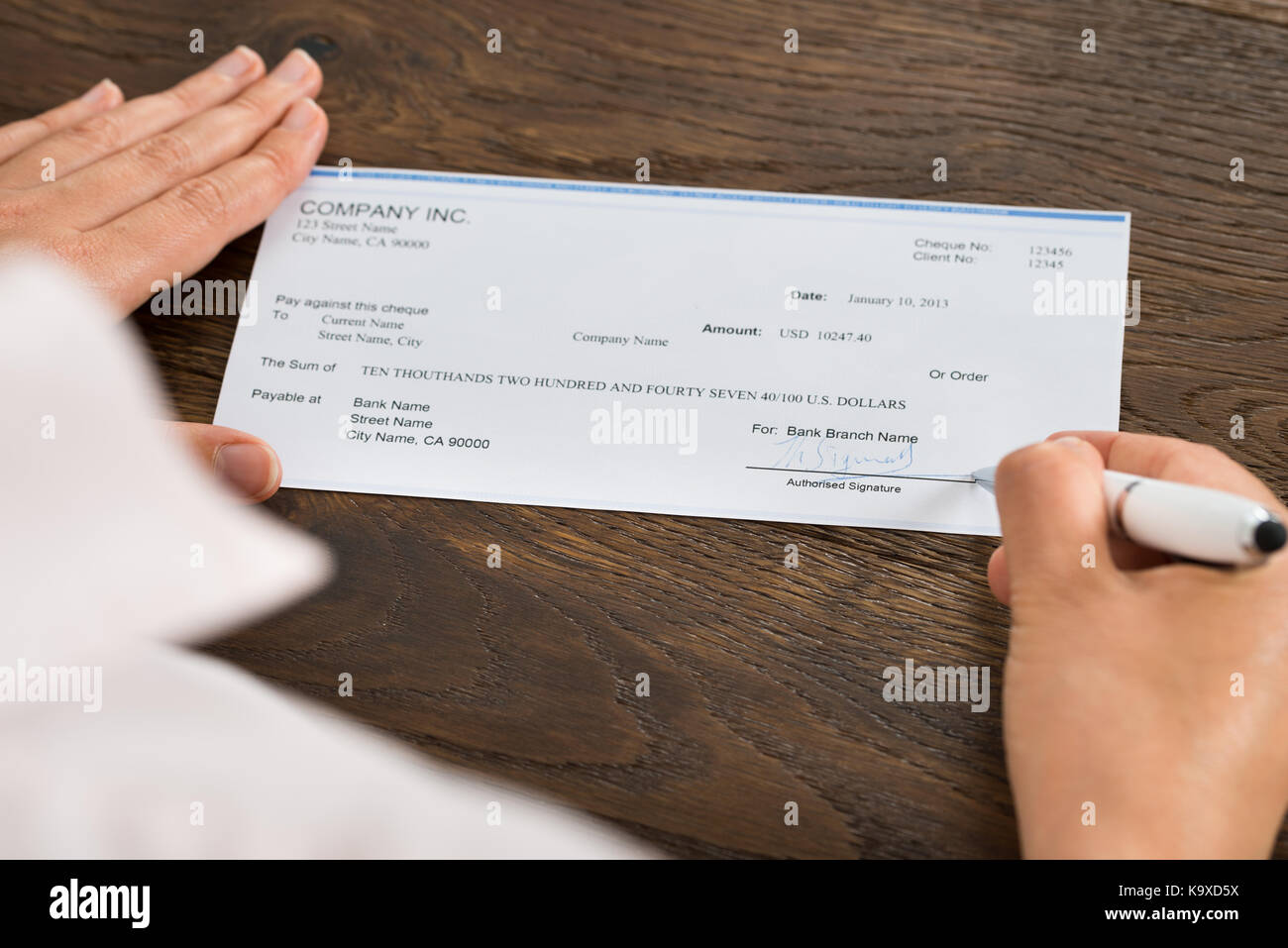 Hand Writing Cheque High Resolution Stock Photography and Images - Alamy