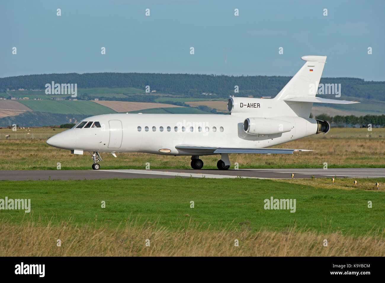 A Dassault 900ex business tri engined Jet arrives at iNVERNESS airport ...