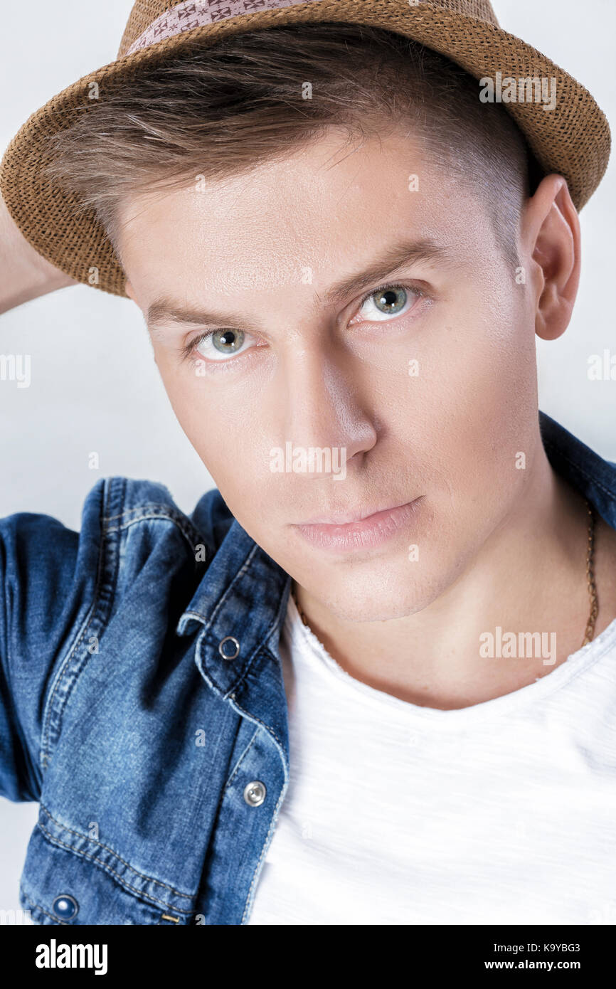 handsome man in denim with hat Stock Photo - Alamy