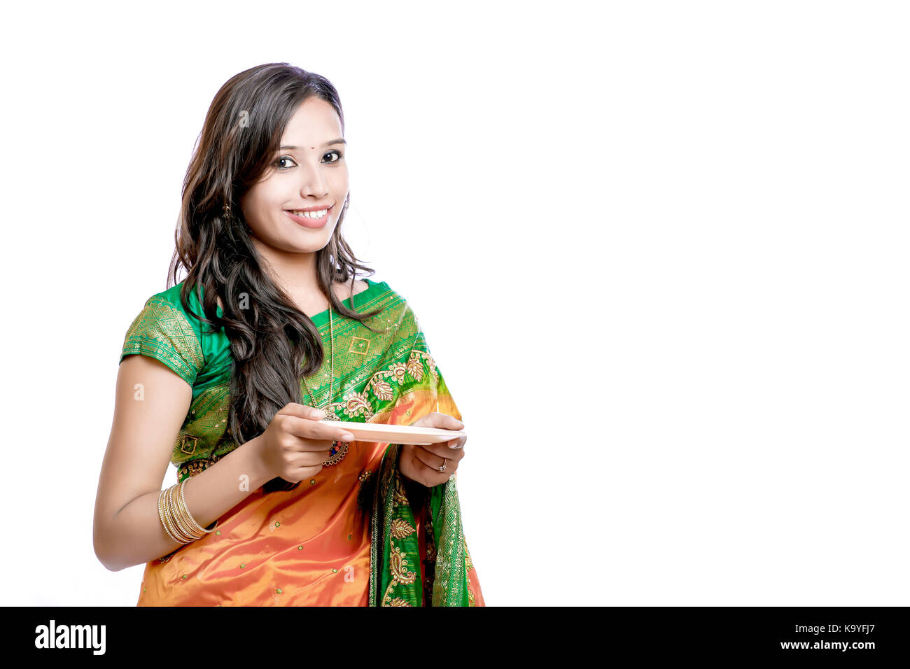 Happy young beautiful traditional Indian woman in traditional saree ...