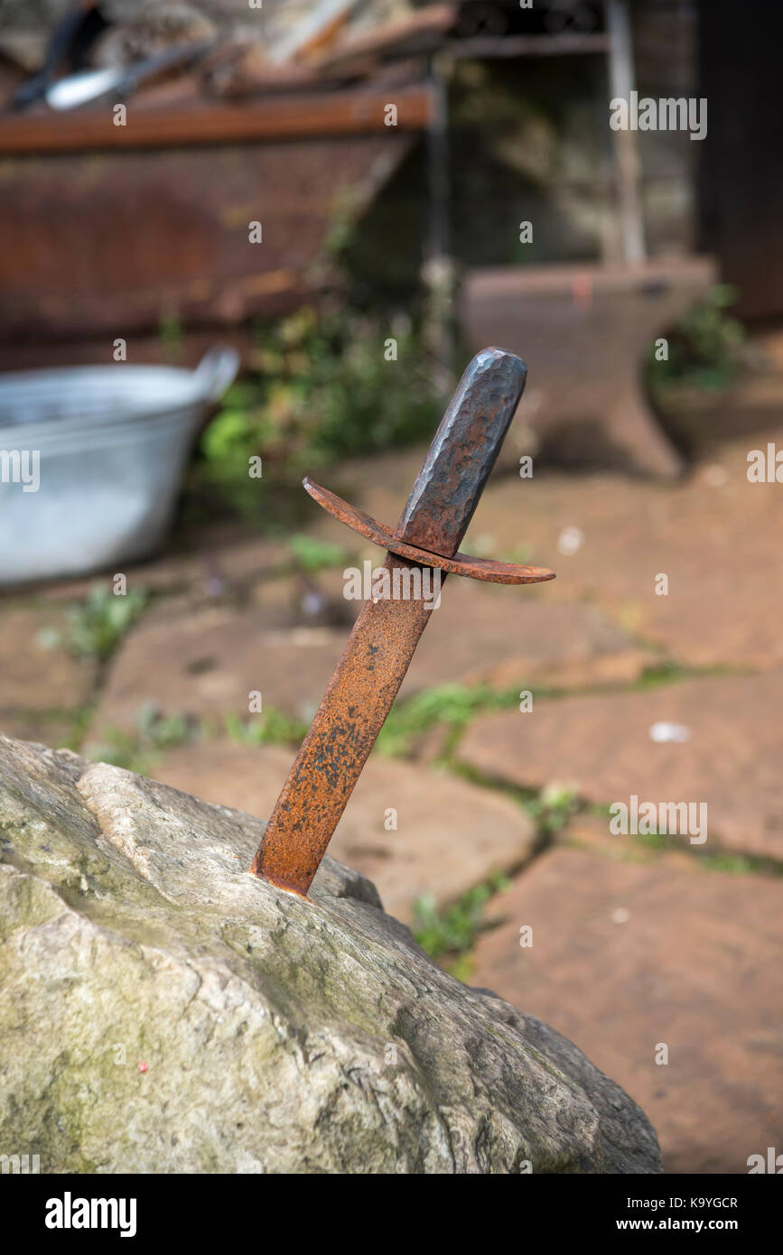 Metal sword in a stone outside the Old Working Smithy, Gunnerside ...