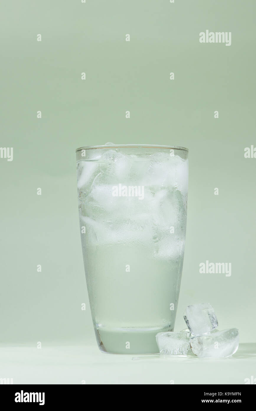 Cold fresh drinking water in glass on table Stock Photo - Alamy