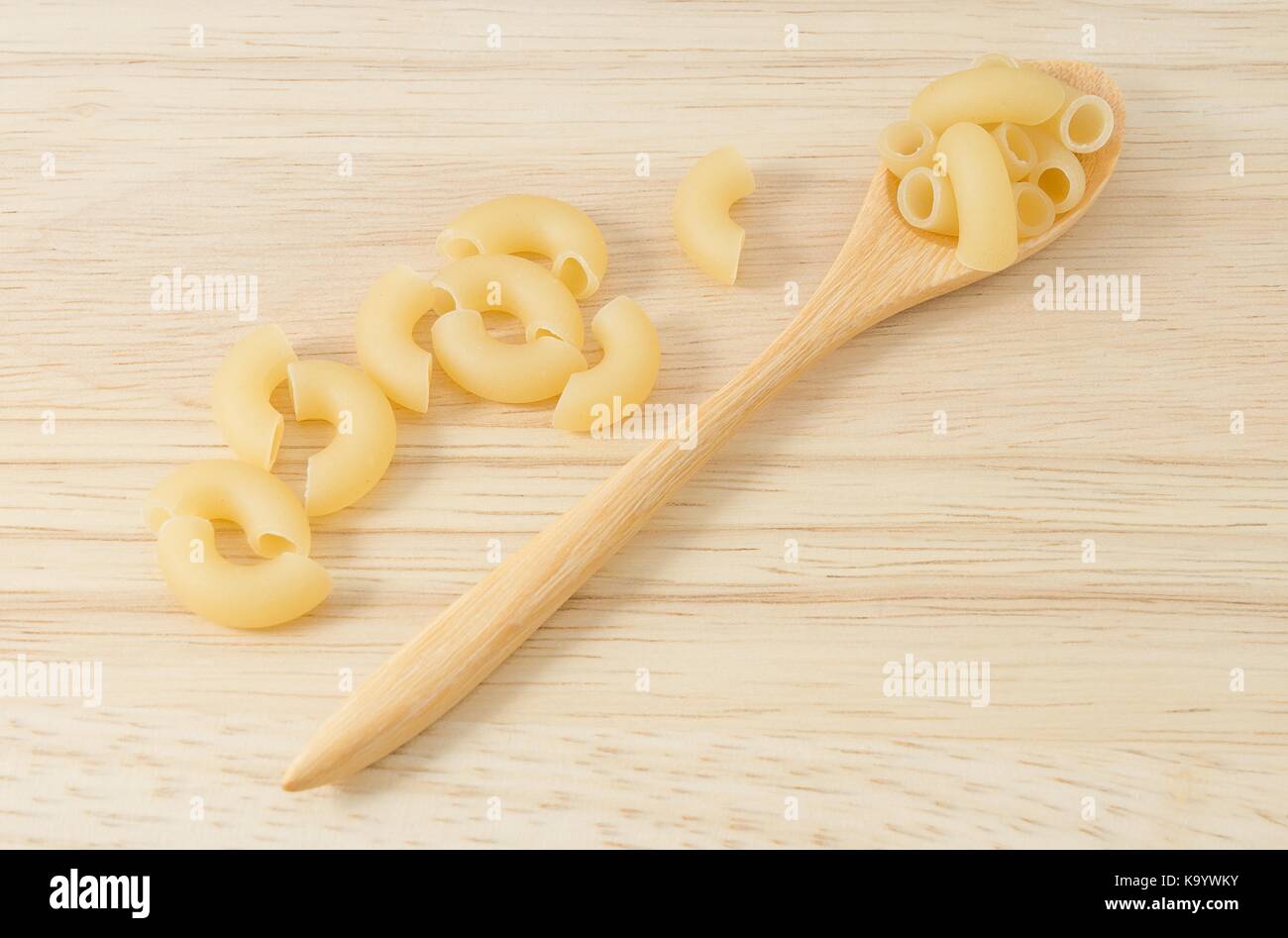 Food and Cuisine, Uncooked Elbow Macaroni or Gomiti Pasta in Wooden ...