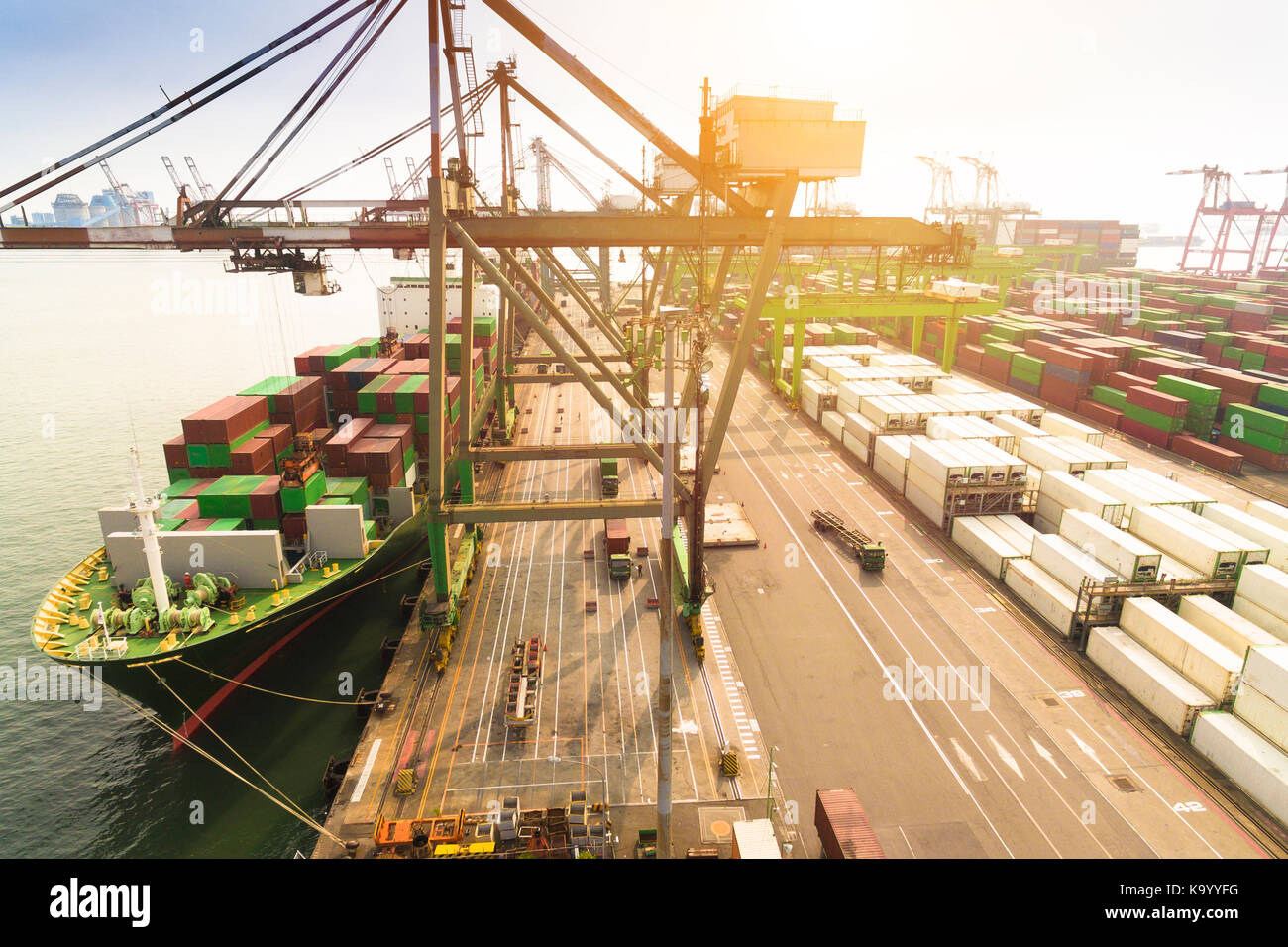 Aerial view of cargo dock and Container Ship Stock Photo - Alamy