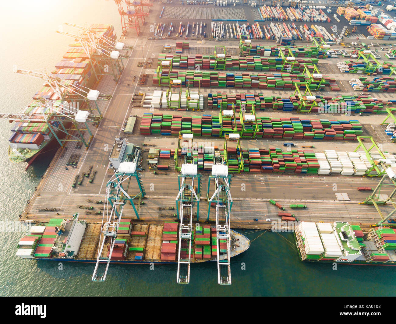 Aerial view of cargo dock and Container Ship Stock Photo - Alamy