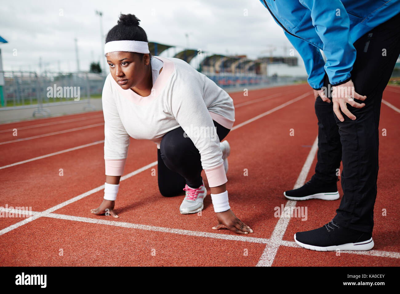 Woman on start Stock Photo - Alamy