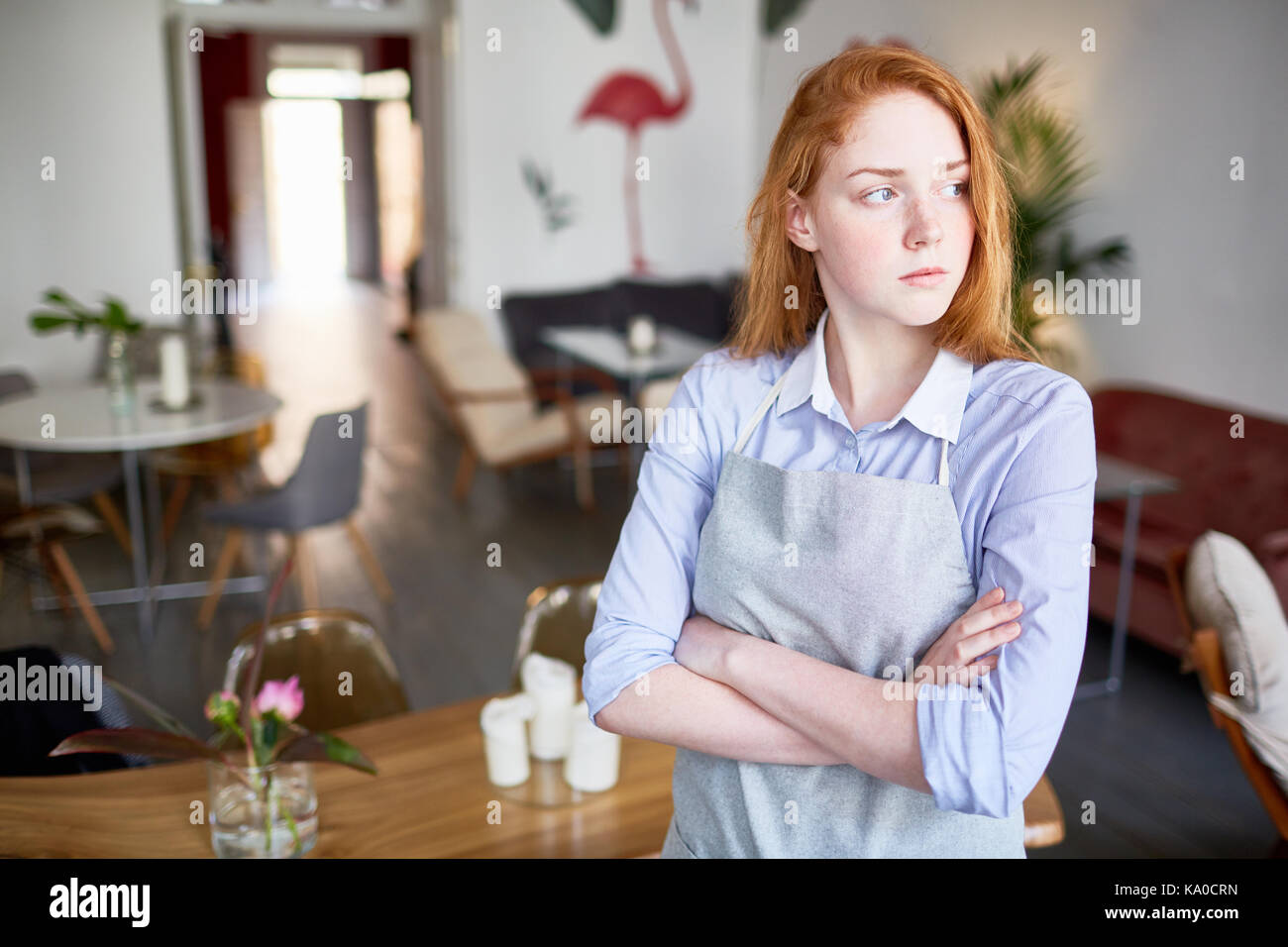Waitress in cafe Stock Photo - Alamy