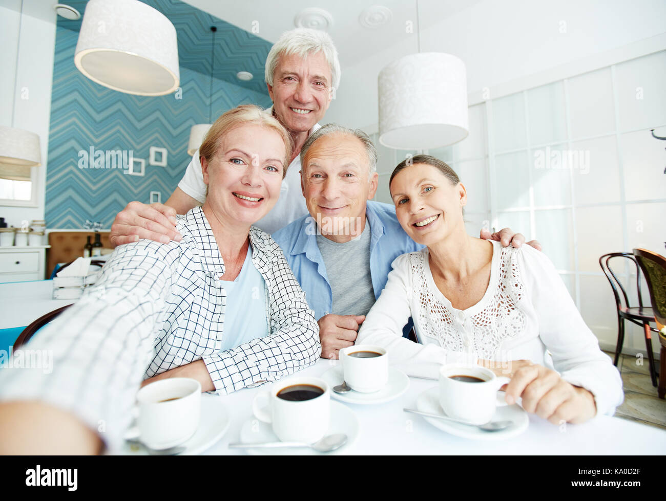 Old friends gathering cafe hi-res stock photography and images - Alamy