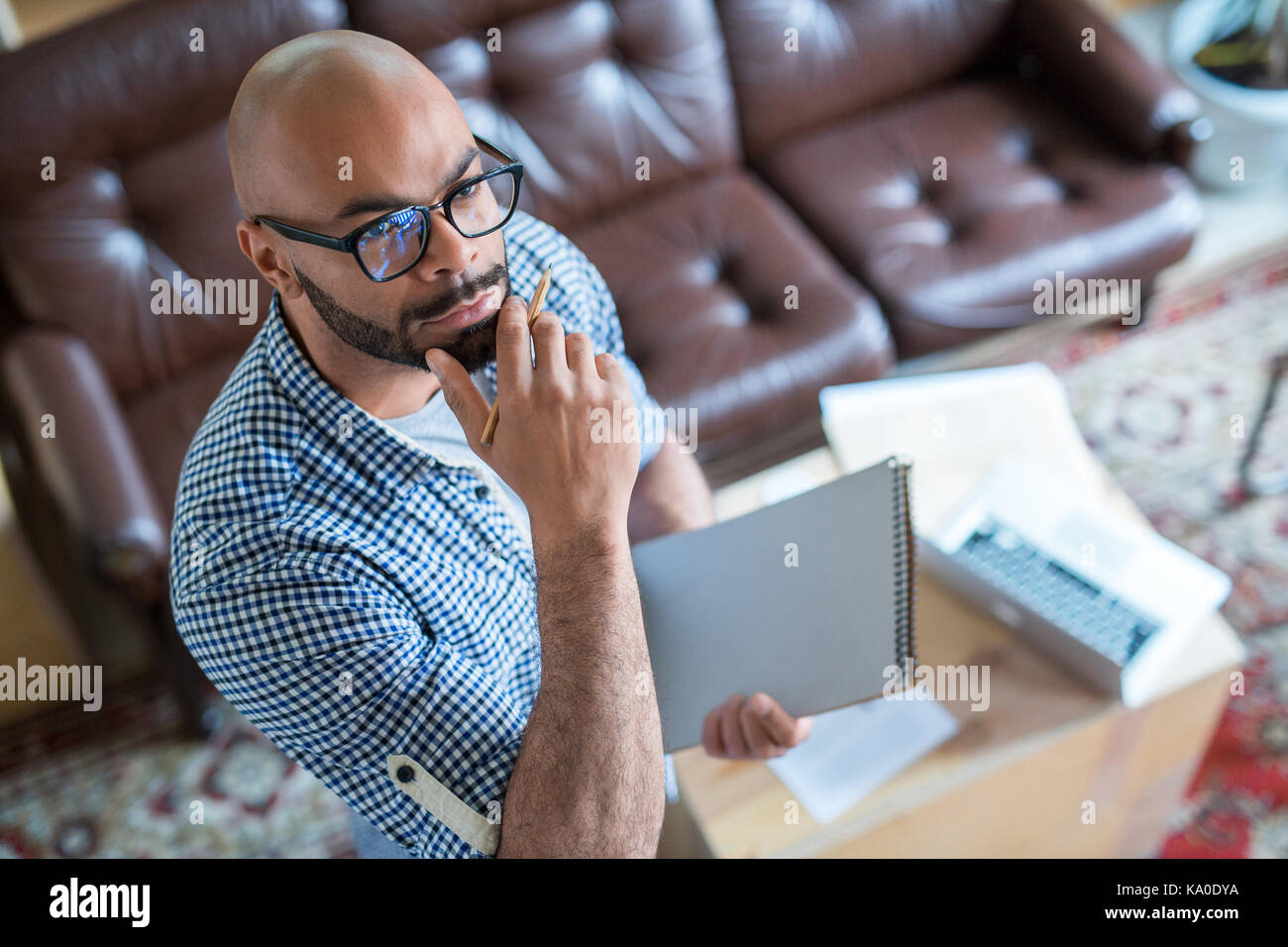 Man with notepad Stock Photo - Alamy