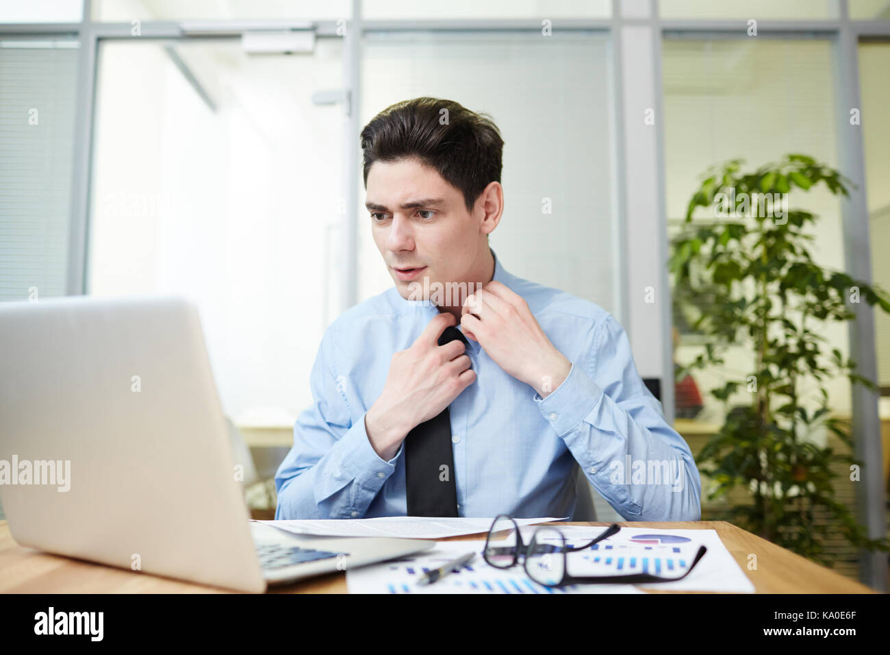 Tired Businessman at Workplace Stock Photo - Alamy