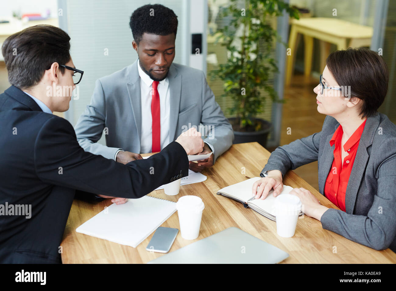Conducting Negotiations with Business Partners Stock Photo - Alamy