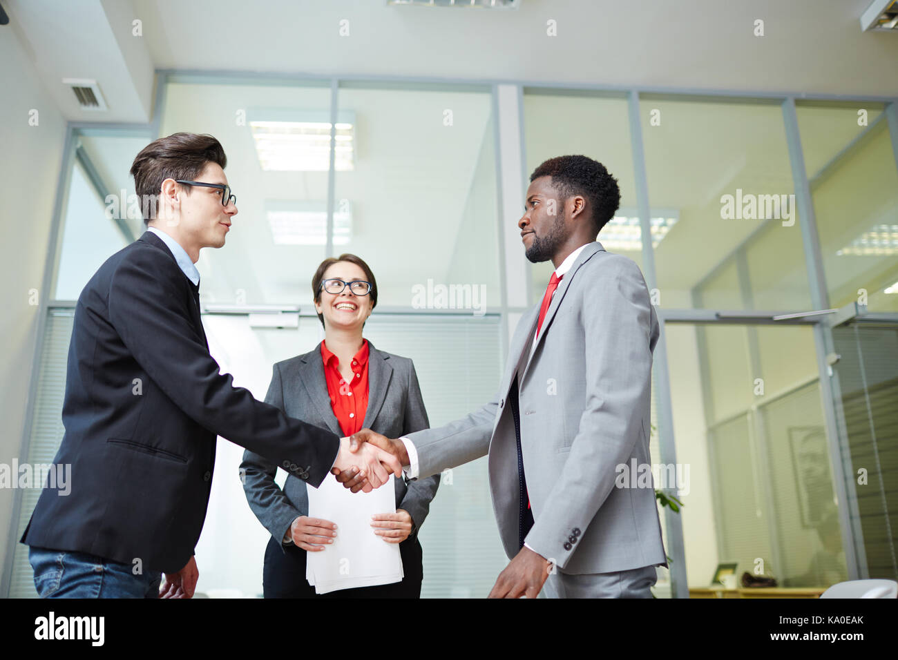 Firm Handshake of Business Partners Stock Photo - Alamy