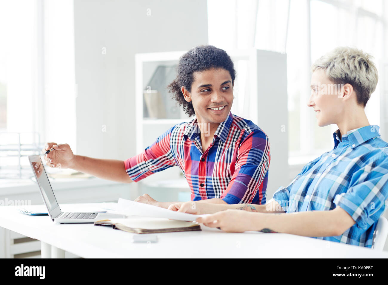 Creative Interior Designers Working Together Stock Photo - Alamy