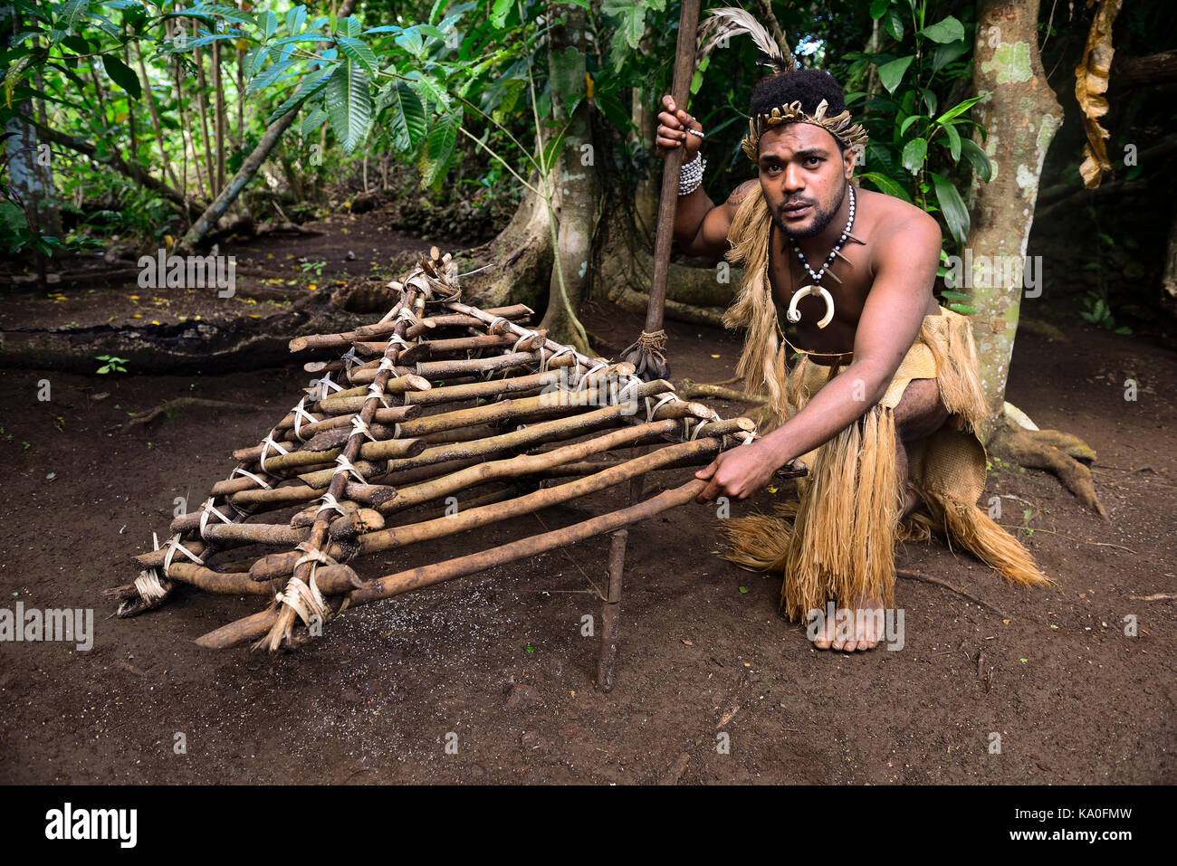 Native with built chicken trap, Ekasup Cultural Village, Island of ...
