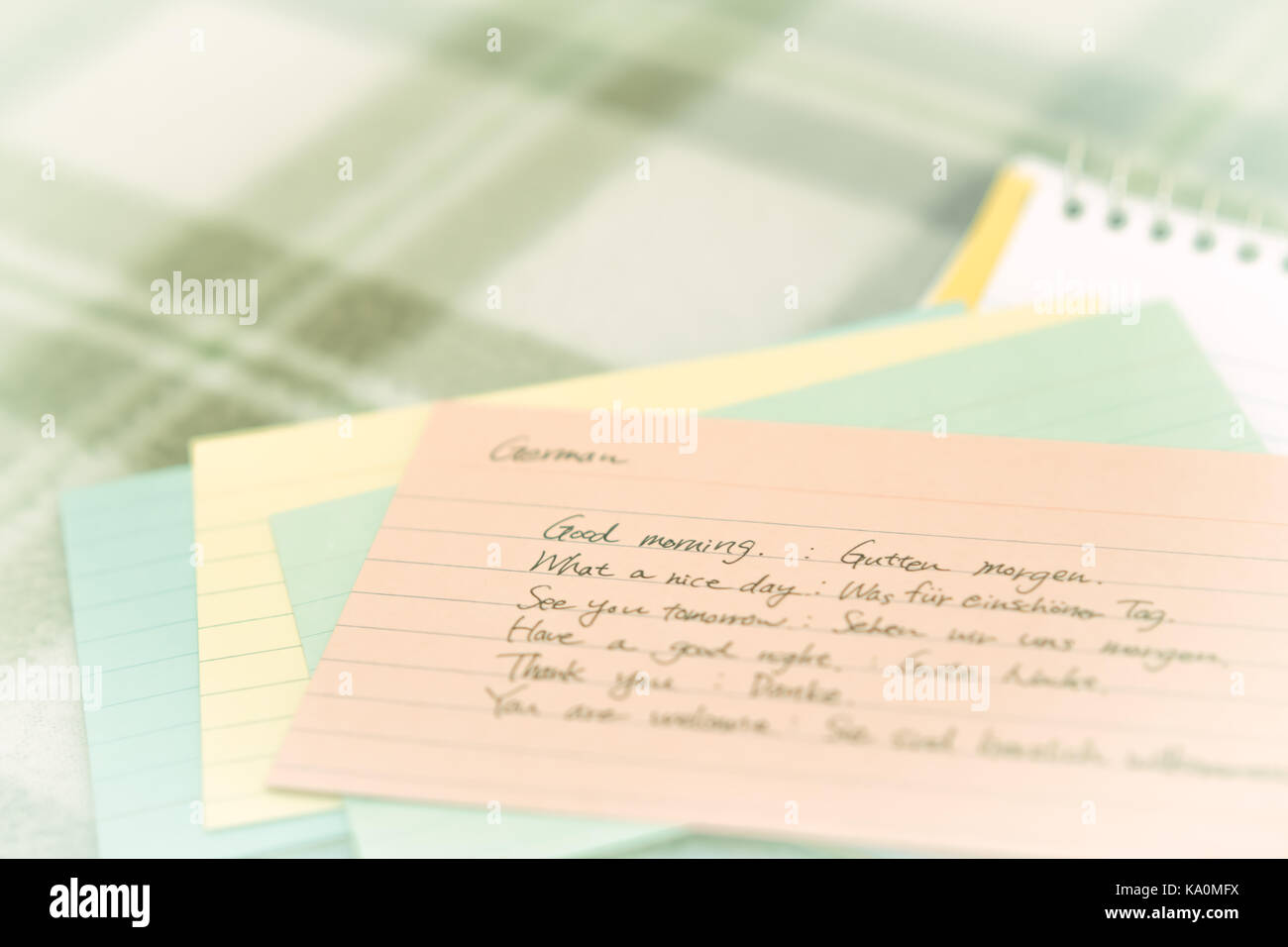 German; Learning New Language Writing Greetings on the Notebook Stock ...