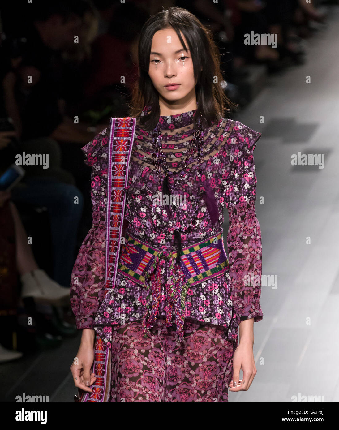 NEW YORK, NY - September 11, 2017: Xiao Wen Ju walks the runway at the ...