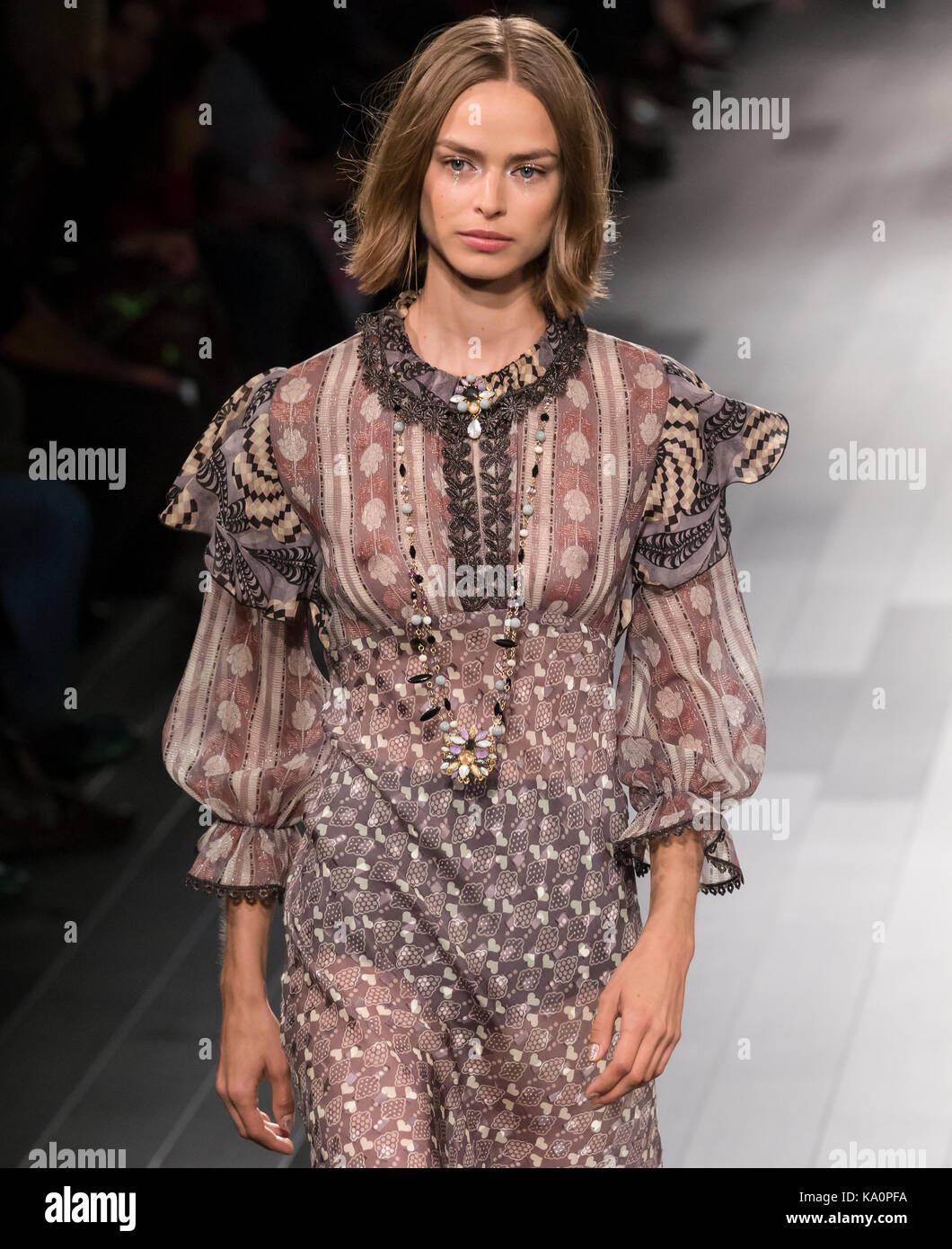 NEW YORK, NY - September 11, 2017: Birgit Kos walks the runway at the ...