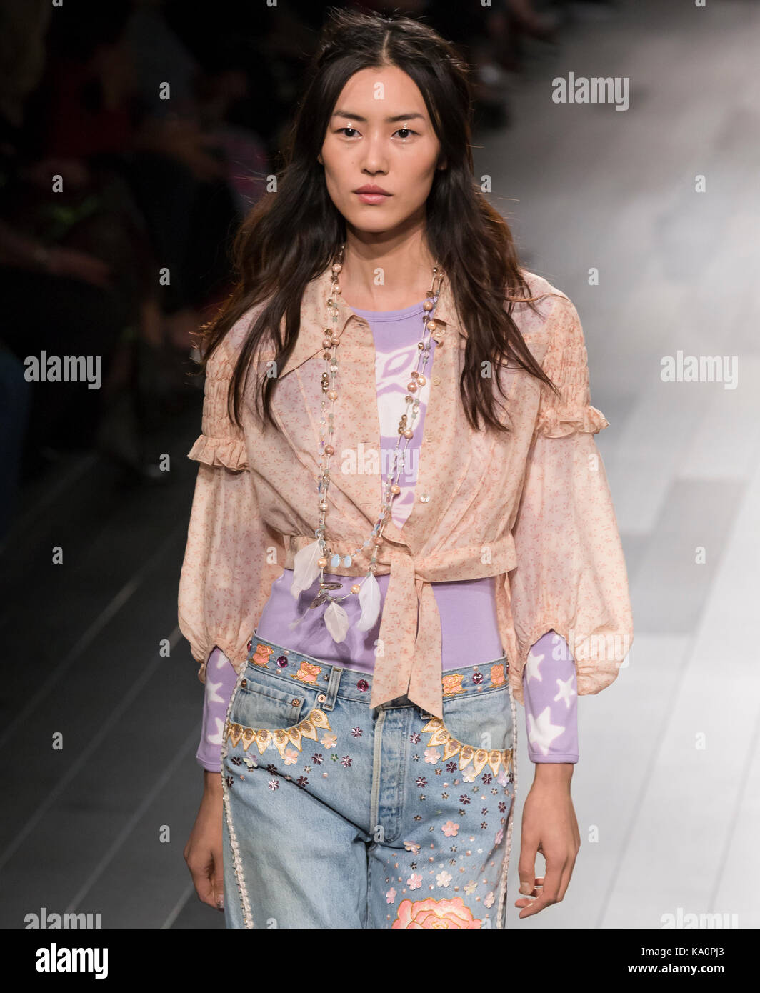 NEW YORK, NY - September 11, 2017: Liu Wen walks the runway at the Anna ...