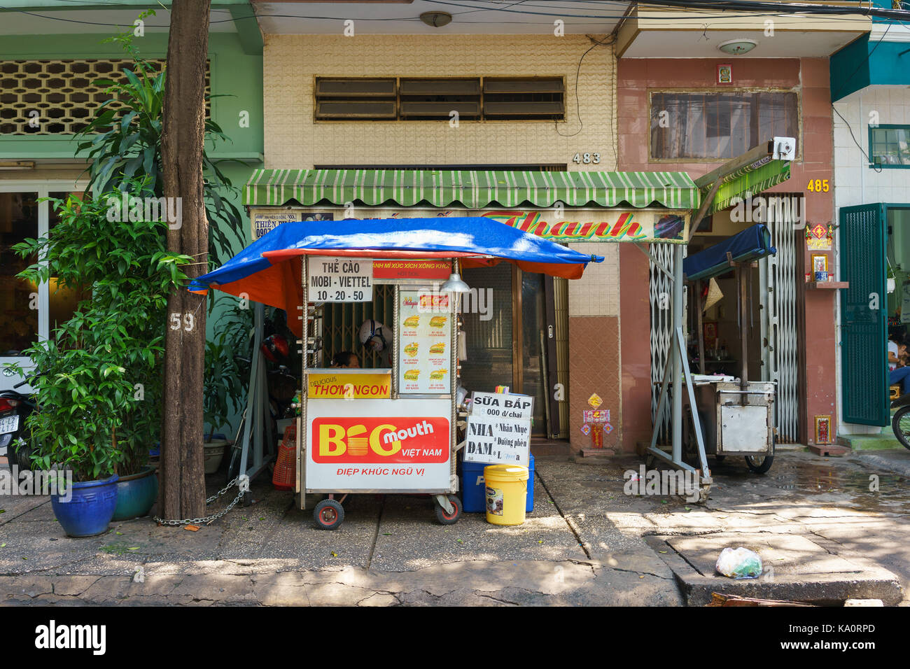 SAIGON, VIETNAM - October 16, 2014: Local fast food restaurant on a ...