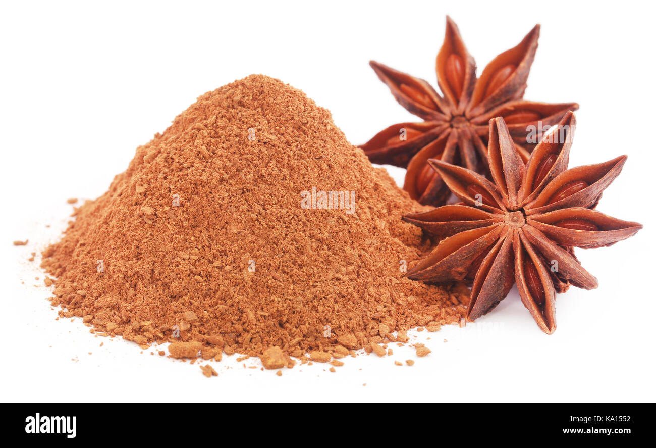 Aromatic star anise with ground spice over white background Stock Photo ...
