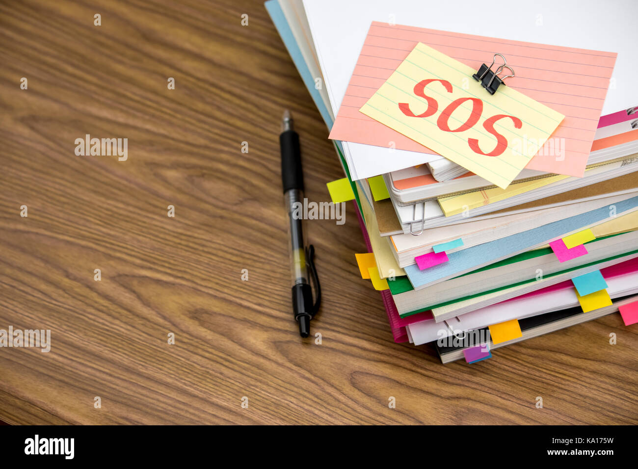 SOS; The Pile of Business Documents on the Desk Stock Photo - Alamy