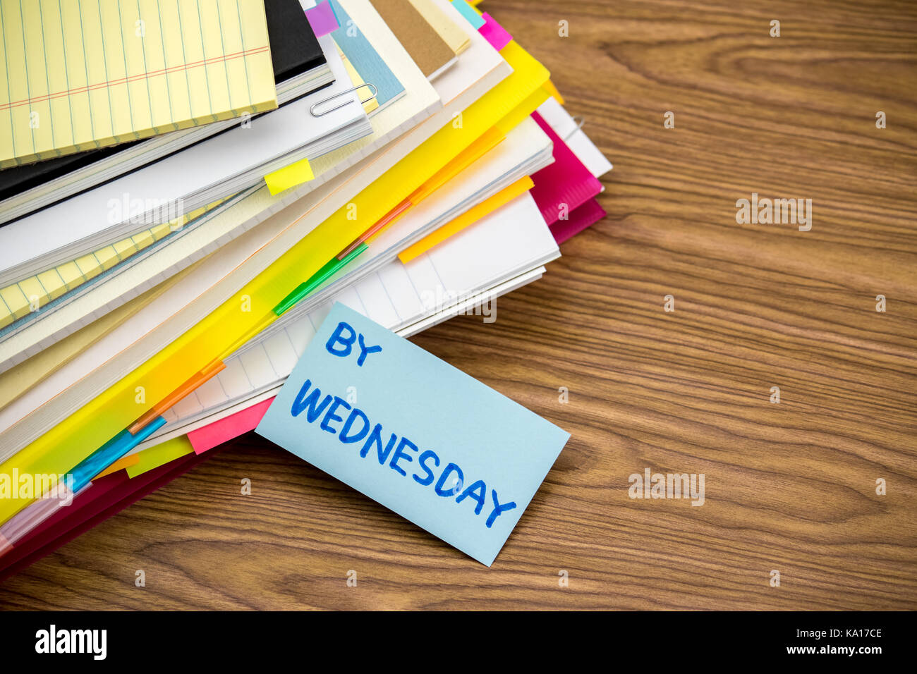 By Wednesday; The Pile of Business Documents on the Desk Stock Photo ...