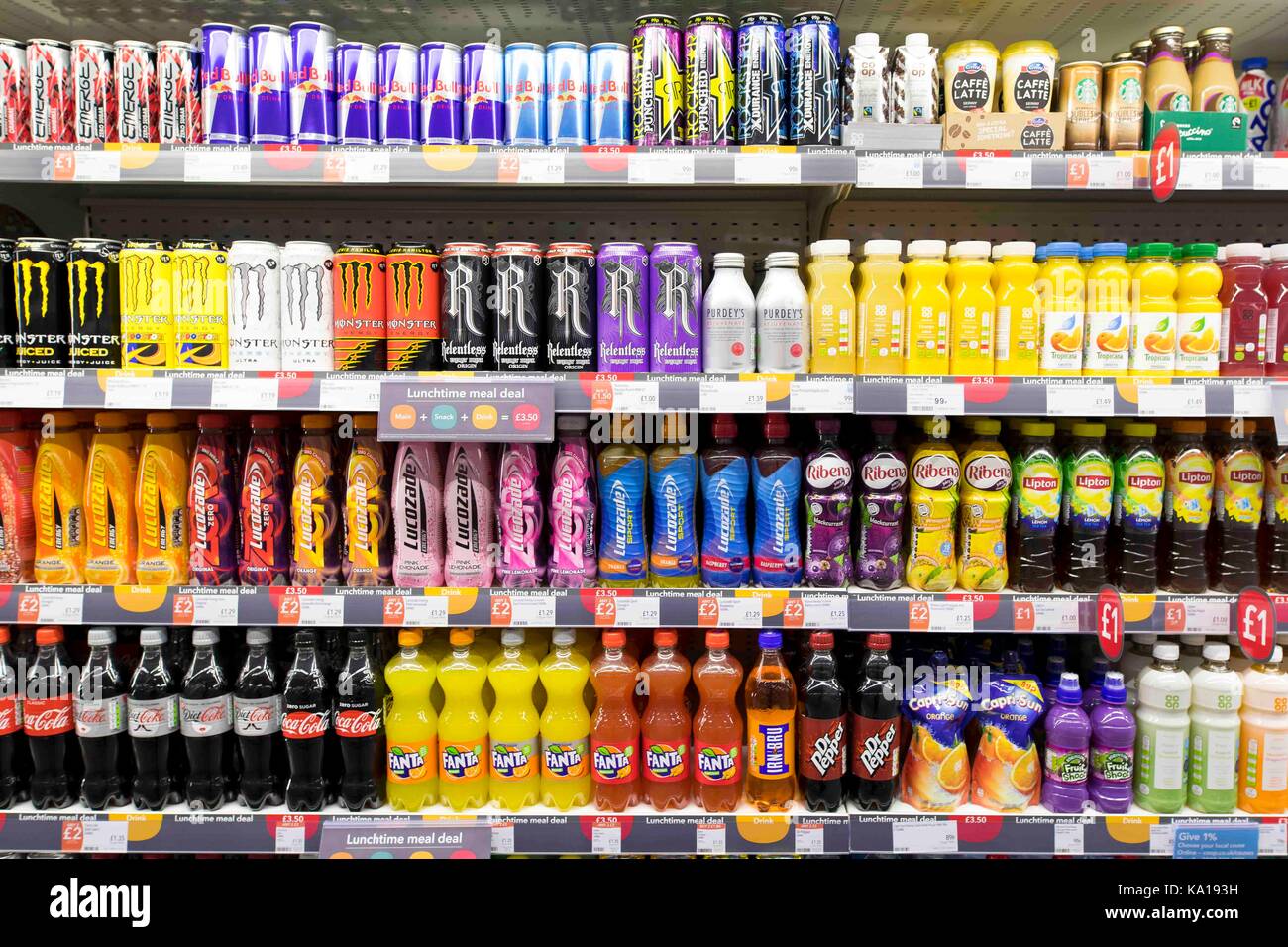Fizzy drinks on display on a supermarket shelf Stock Photo - Alamy