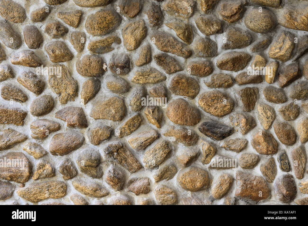 Embed stone in cement wall, texture and pattern Stock Photo - Alamy
