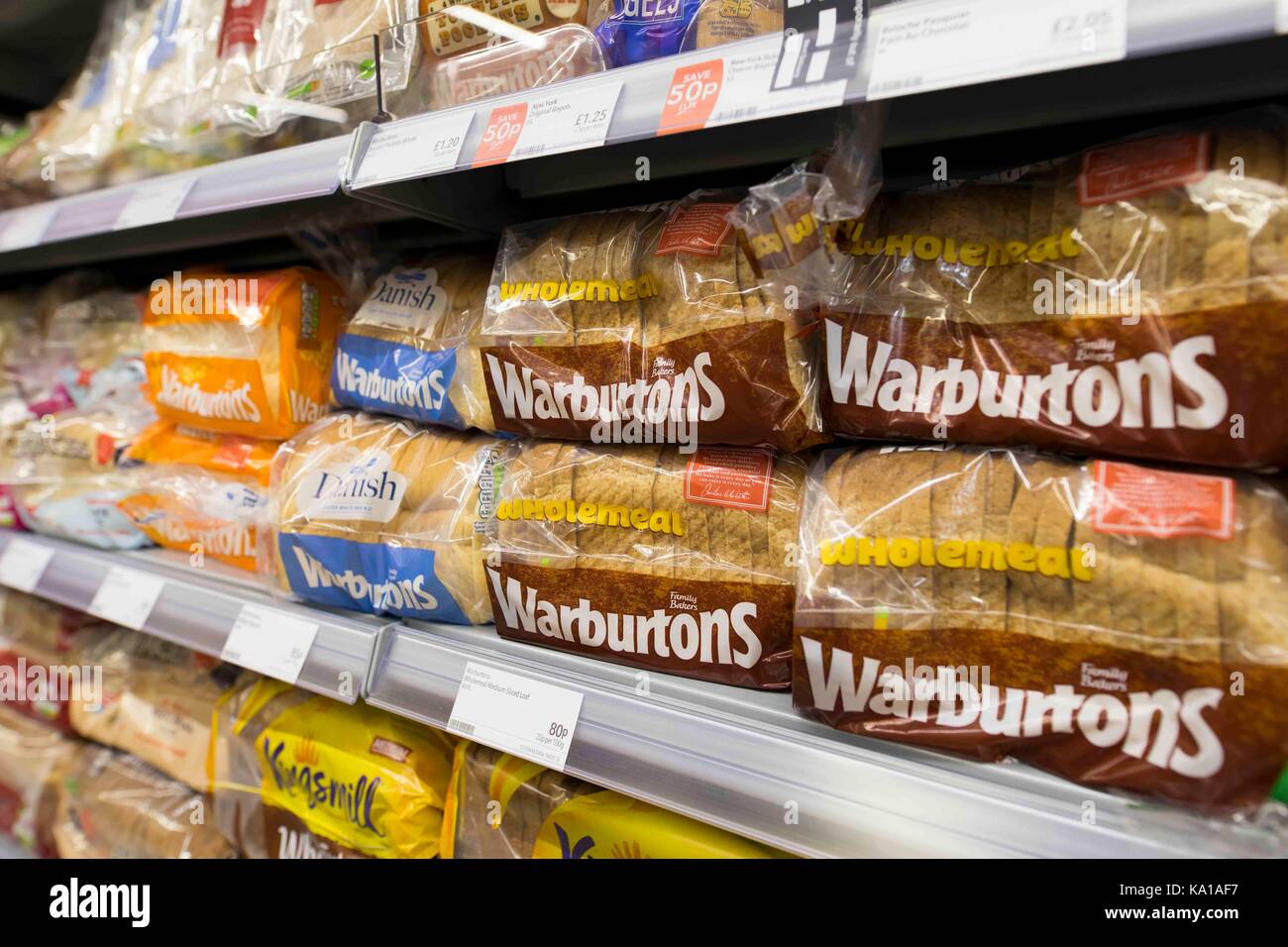Bread on sale on a shelf in a supermarket store Stock Photo - Alamy