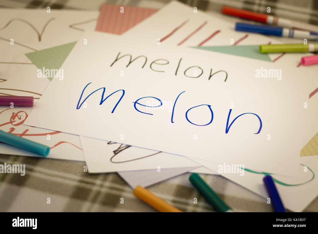 English; Kids Writing Name of the Fruits for Practice Stock Photo - Alamy