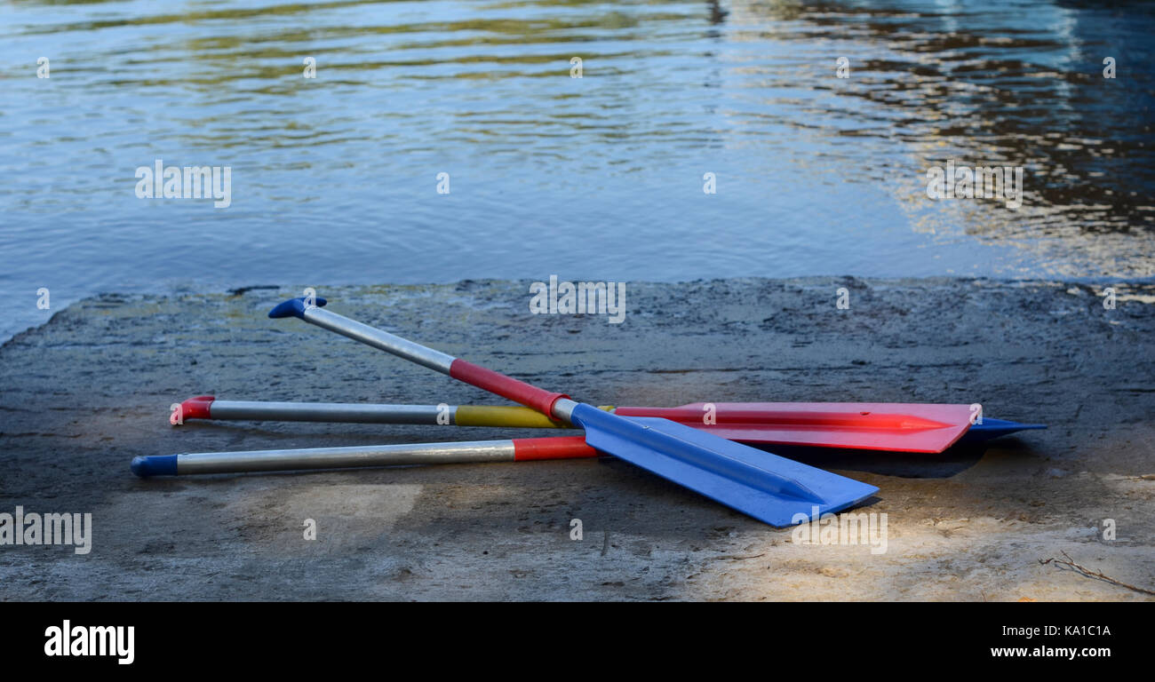 Oars for a boat on a pier Stock Photo - Alamy