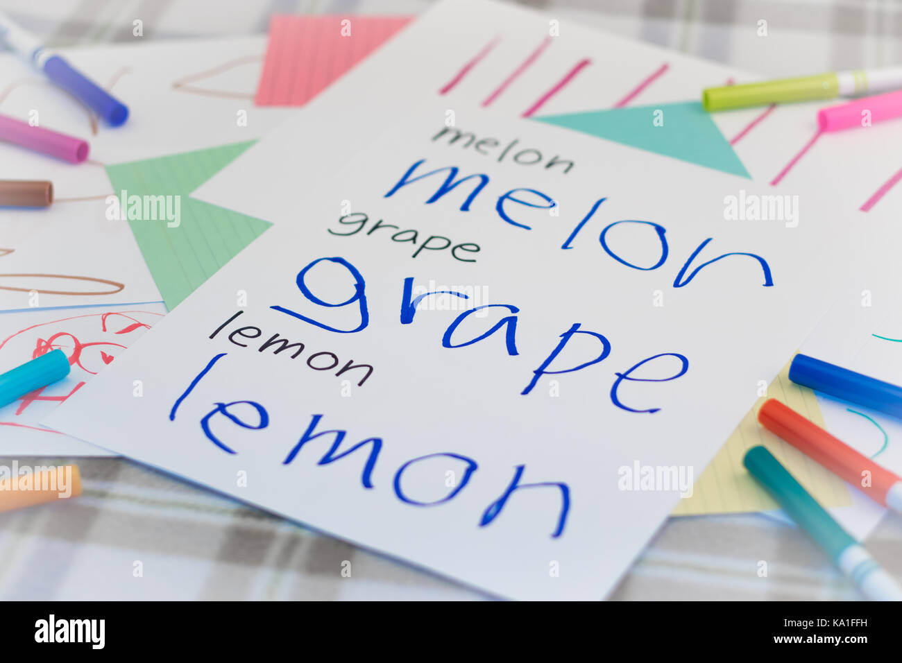 Child writing name hi-res stock photography and images - Alamy