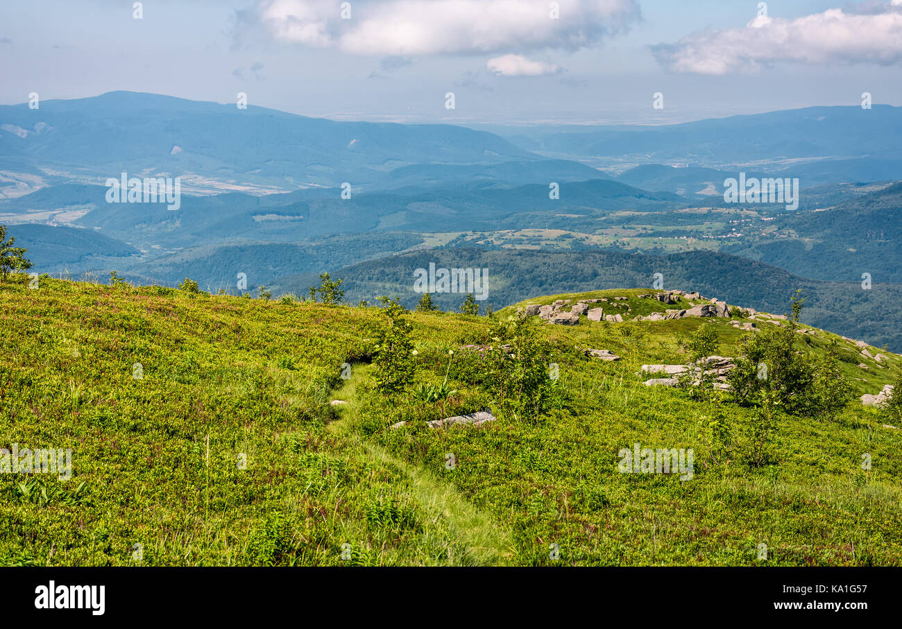 grassy hillside with huge boulders. beautiful mountainous landscape on ...