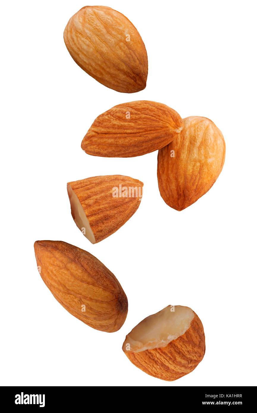 Falling almond nut isolated on white background with clipping path as ...