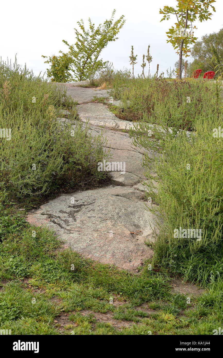 Pathway consisting of granite on a hill Stock Photo - Alamy