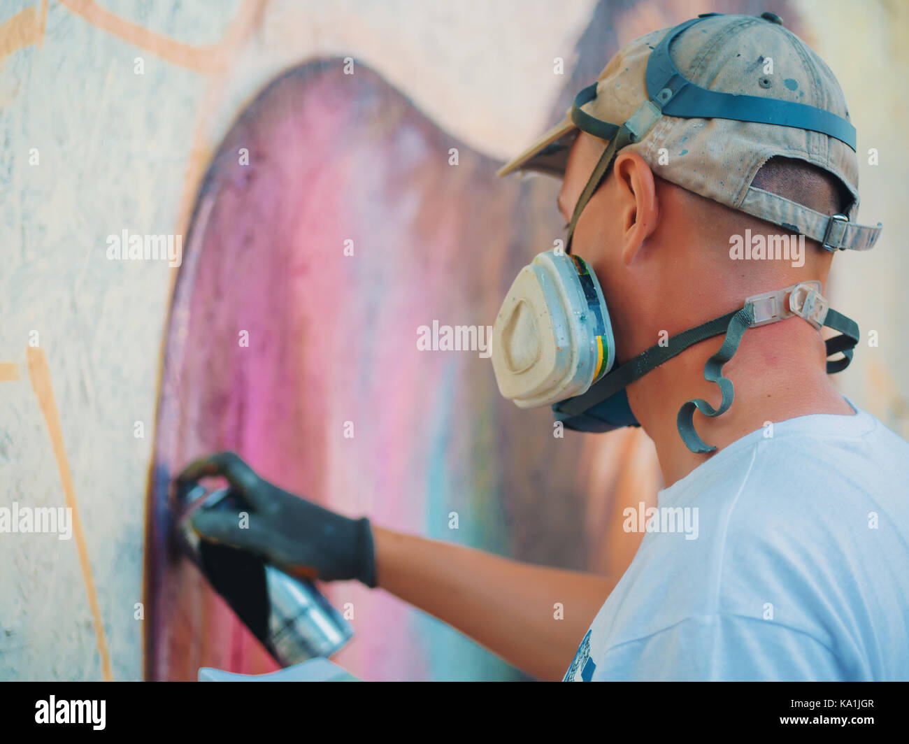 Man mask spray paint can hi-res stock photography and images - Alamy
