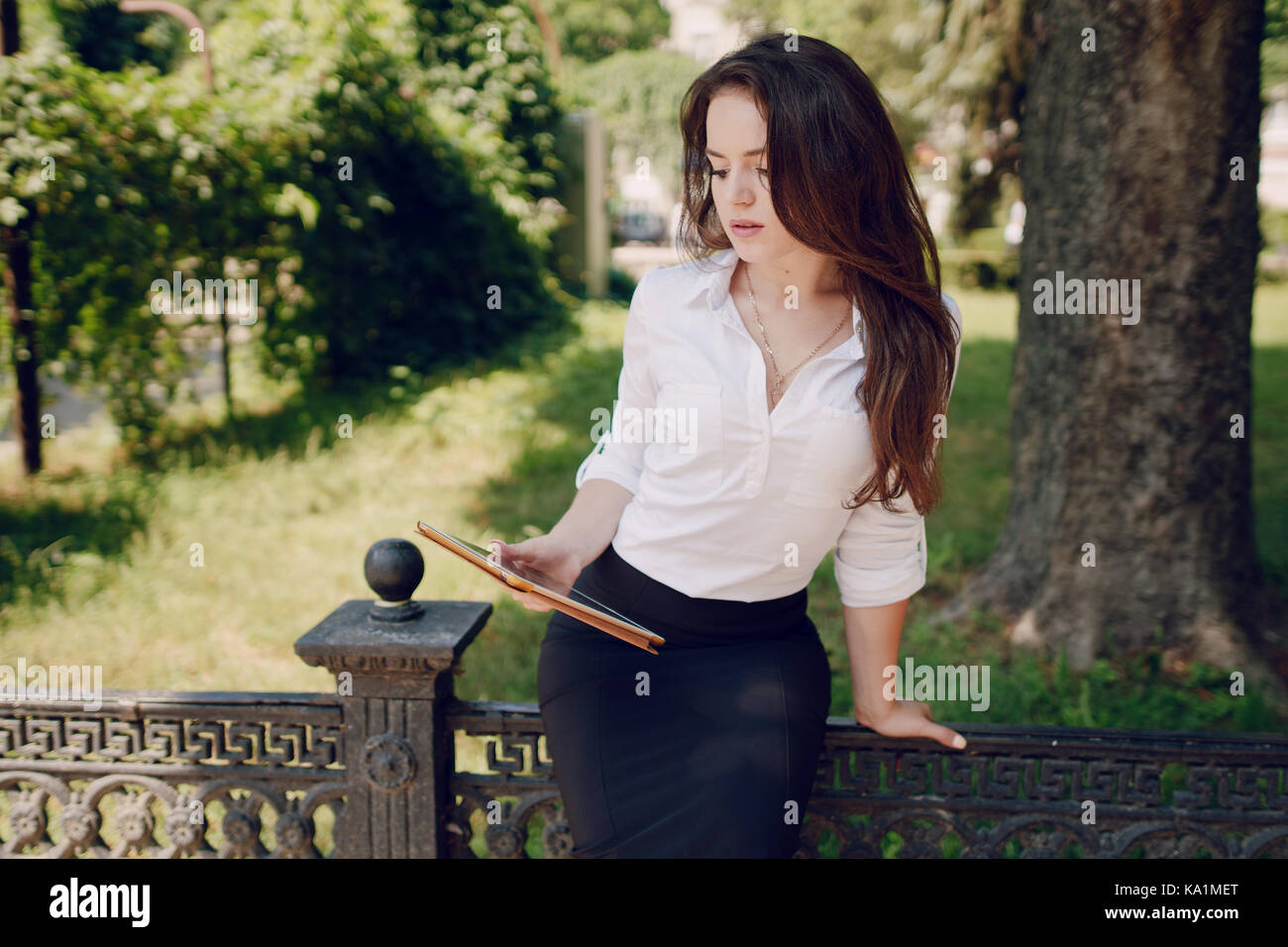 business woman enjoys gadgets Stock Photo - Alamy