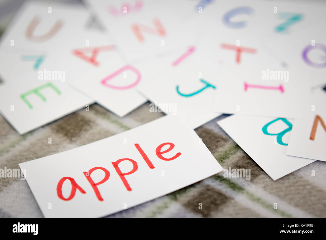 English; Learning the New Word with the Alphabet Cards Stock Photo - Alamy