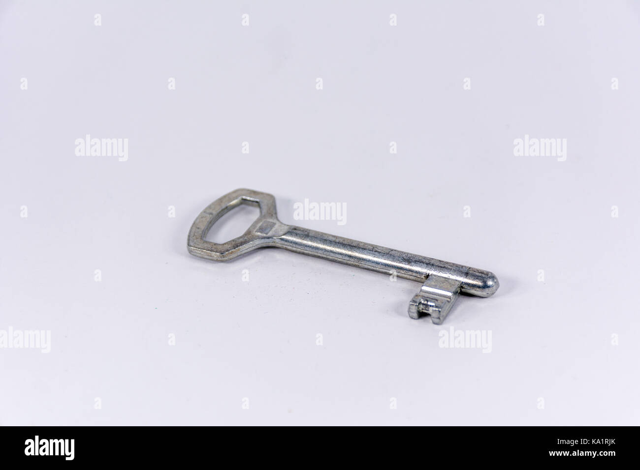 Simple metal key old style Stock Photo - Alamy