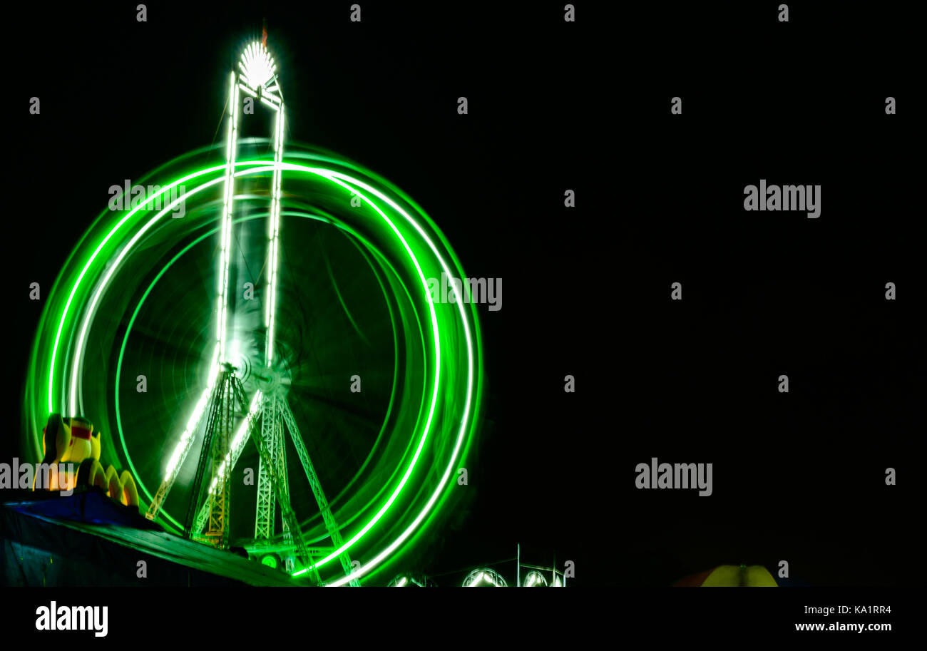 Giant wheel green fun Stock Photo - Alamy