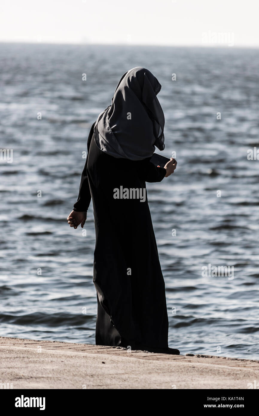 Muslim girl walking hi-res stock photography and images - Alamy